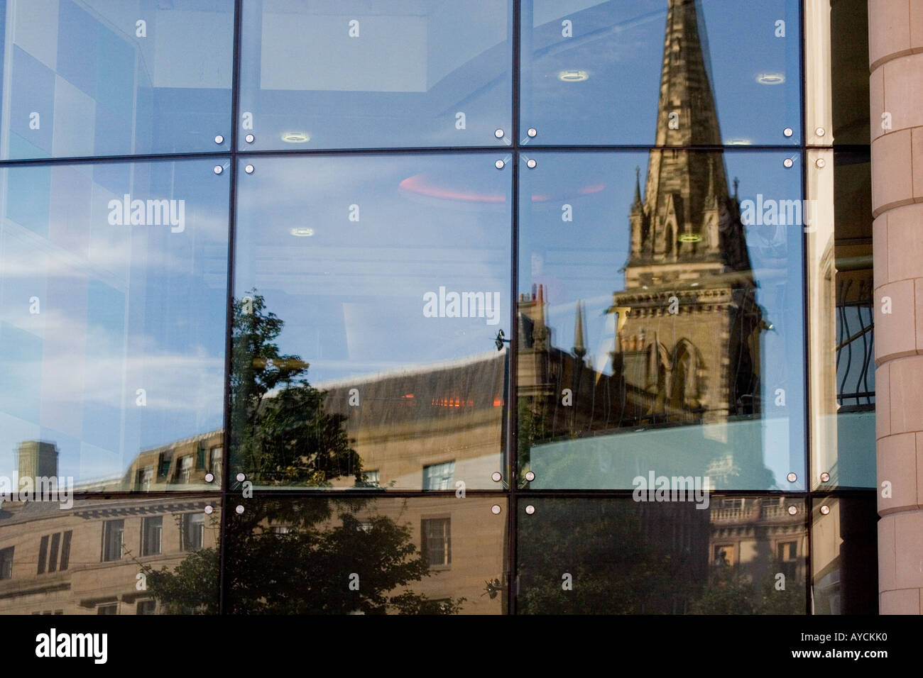 Reflections of St Paul`s church through the large front windows of the ...