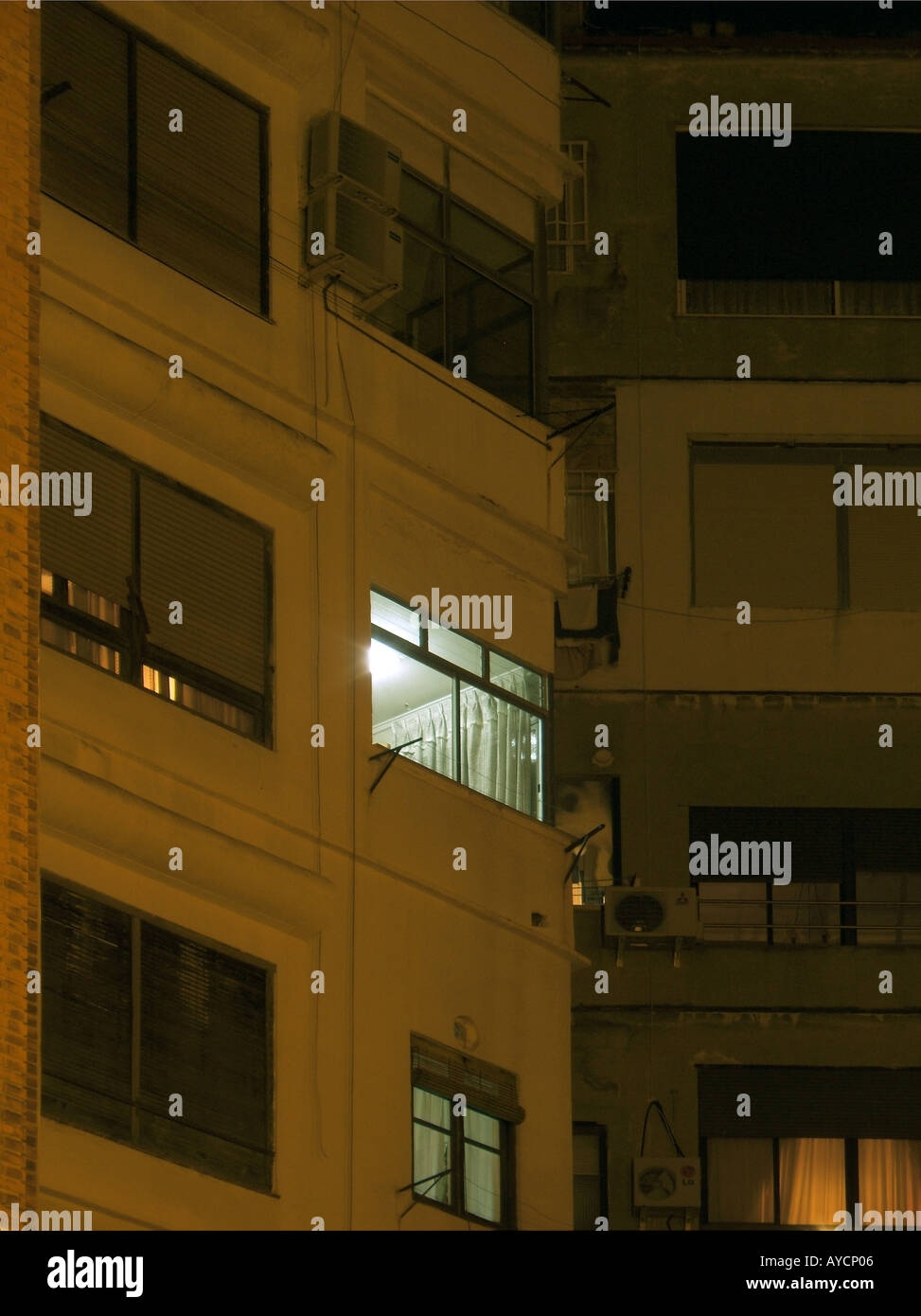 apartment office block at night Stock Photo - Alamy