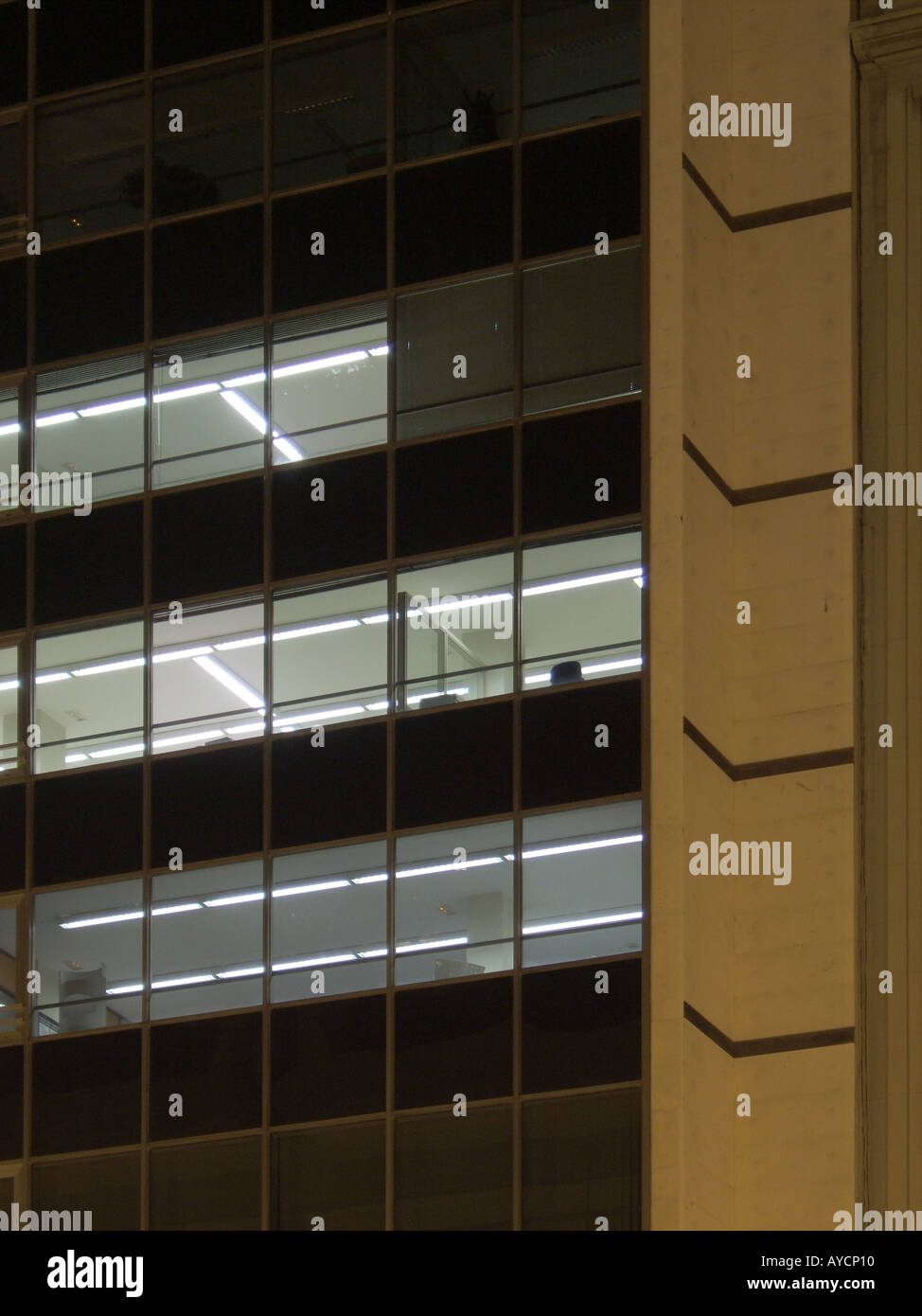 lights on in office block Stock Photo - Alamy