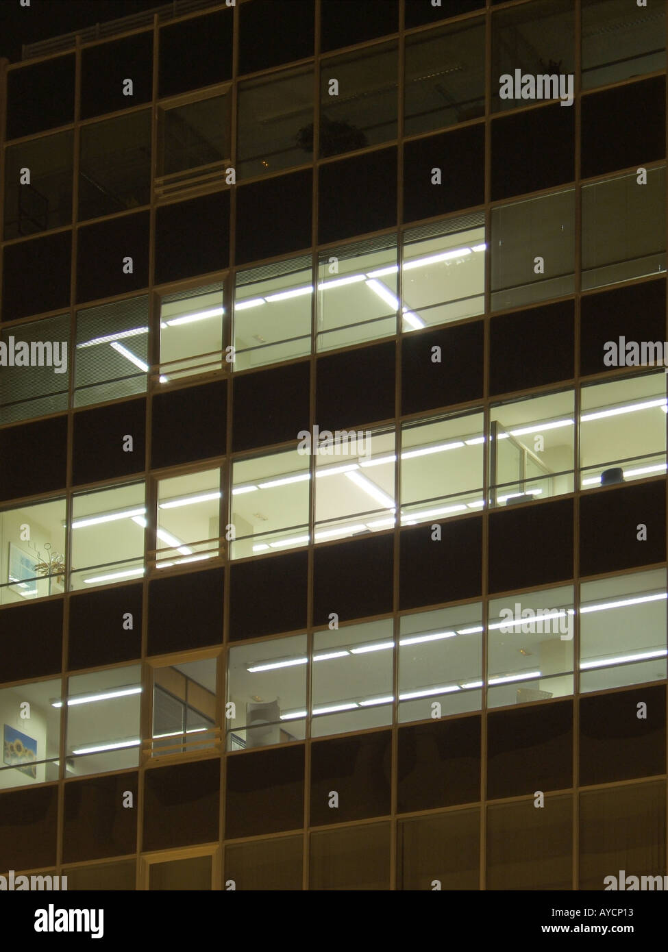 lights on in office block Stock Photo - Alamy