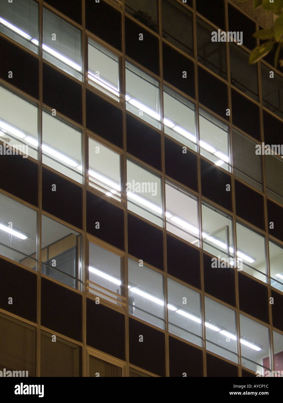 lights on in office block Stock Photo - Alamy