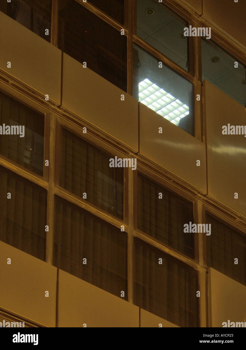 lights on in office block Stock Photo - Alamy