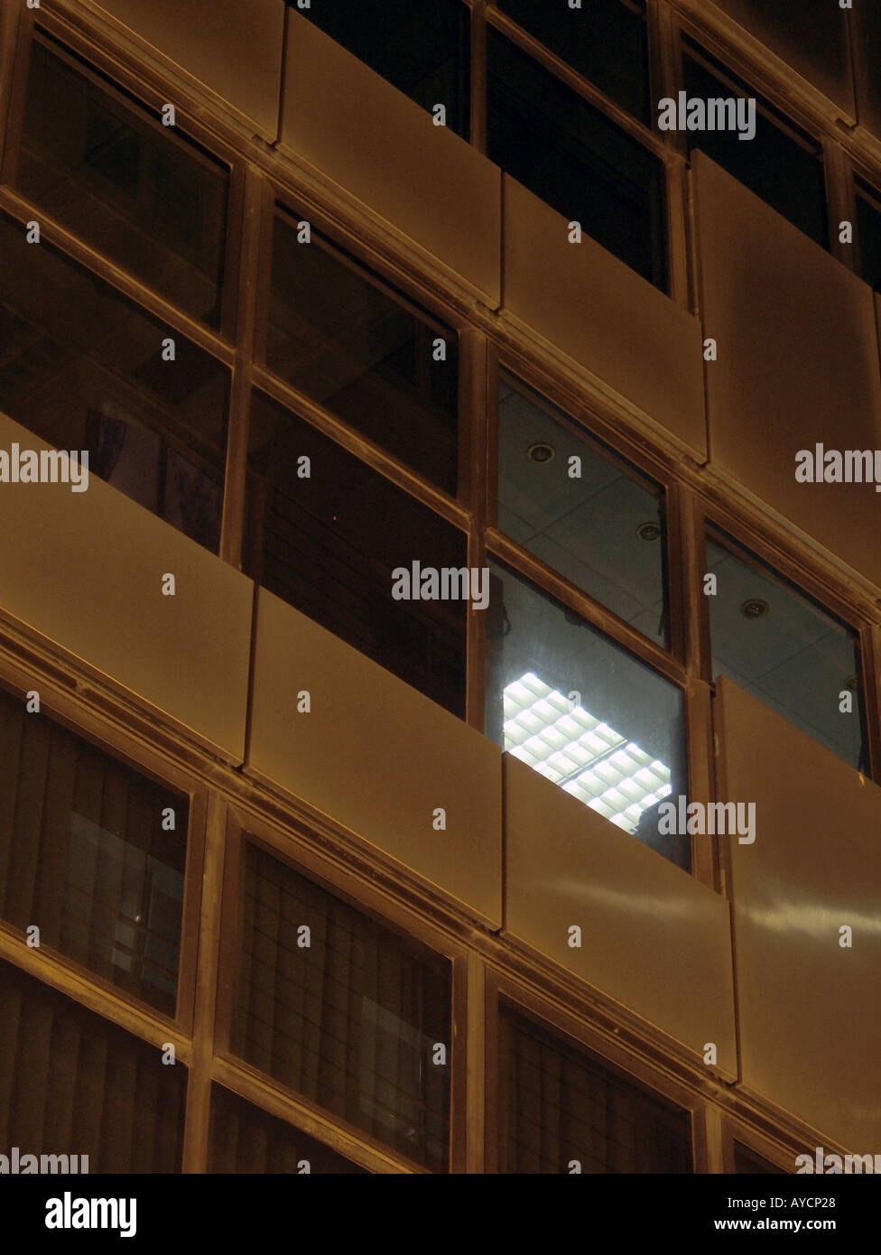 lights on in office block Stock Photo - Alamy