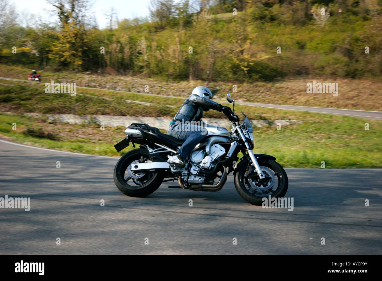 Man riding motorbike Stock Photo - Alamy
