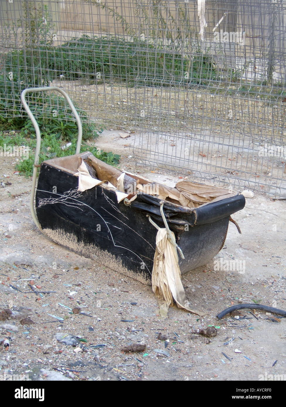 old fashioned pram abandoned on derelict ground Stock Photo - Alamy