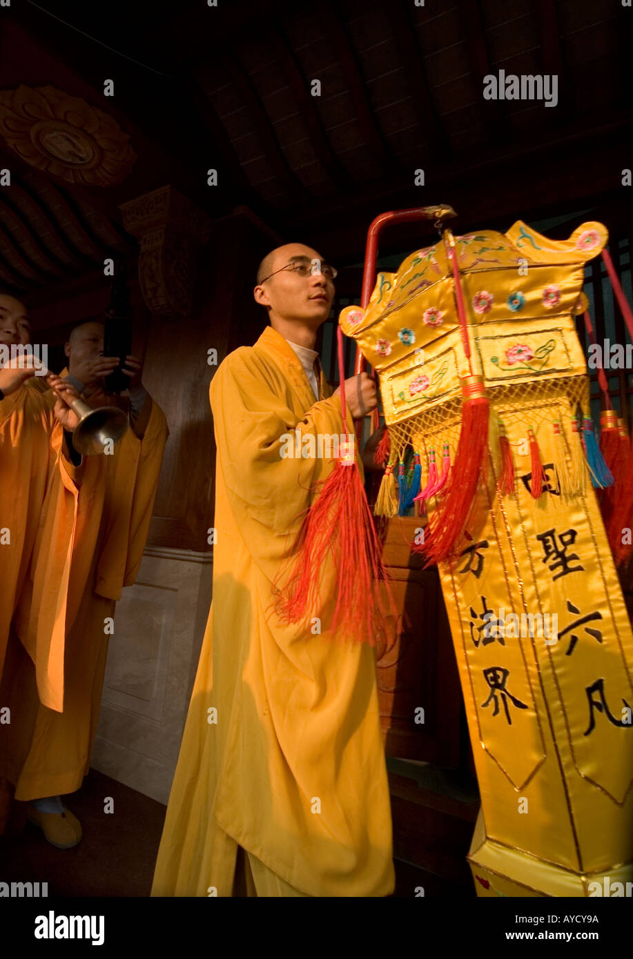 A Buddhist monk during a religious procession at Jingan Temple, in ...
