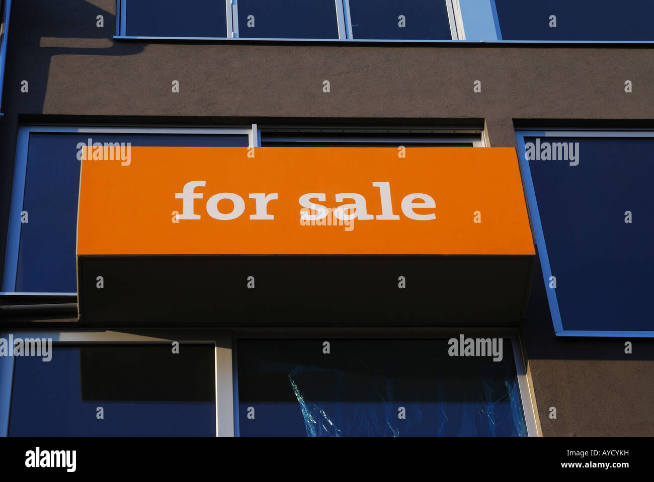 For sale sign on new building Stock Photo - Alamy