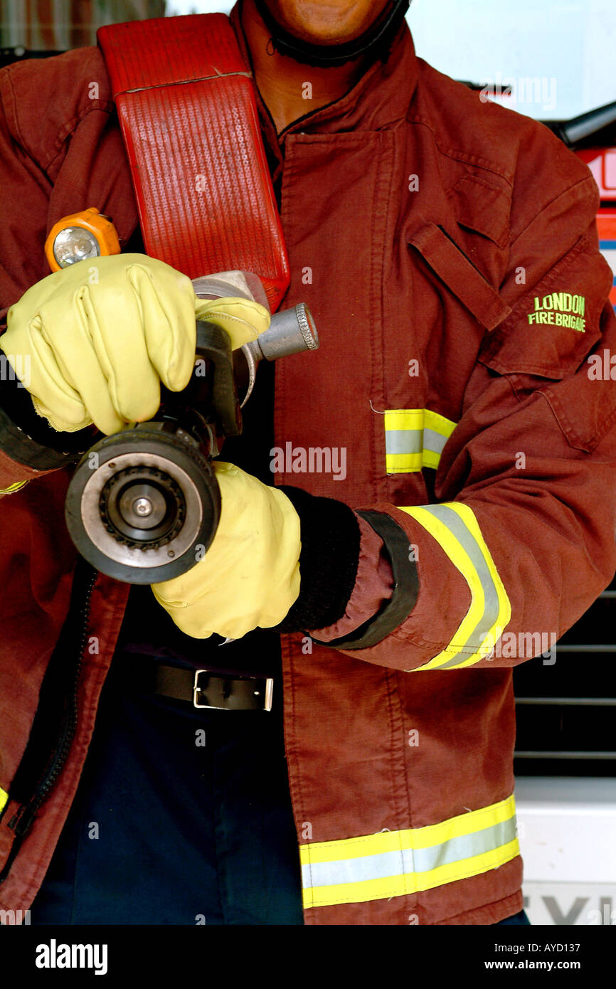 Close up of a London Fire Brigade fireman showing his uniform and a ...