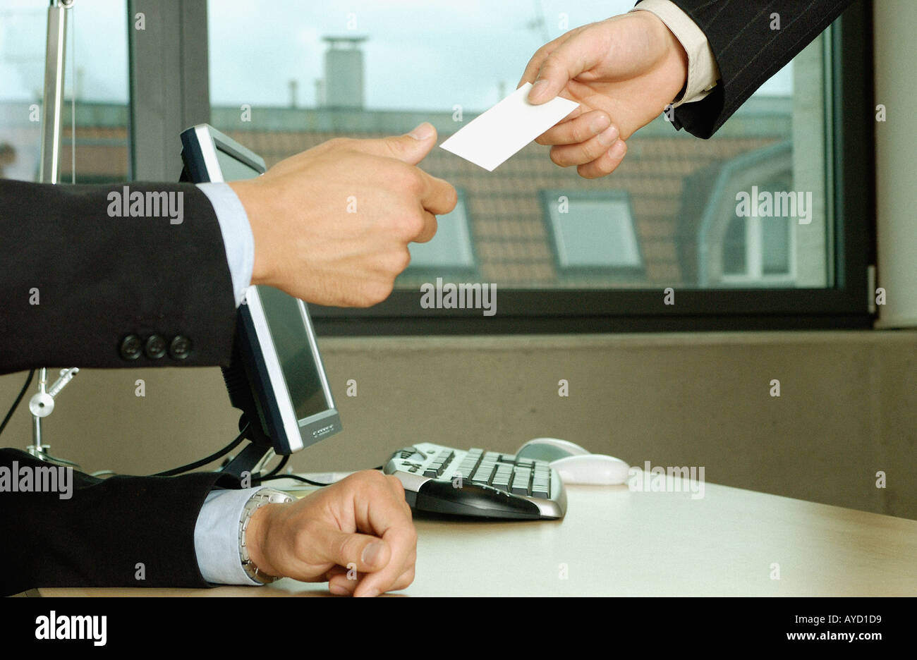 Businessmen exchanging cards Stock Photo - Alamy