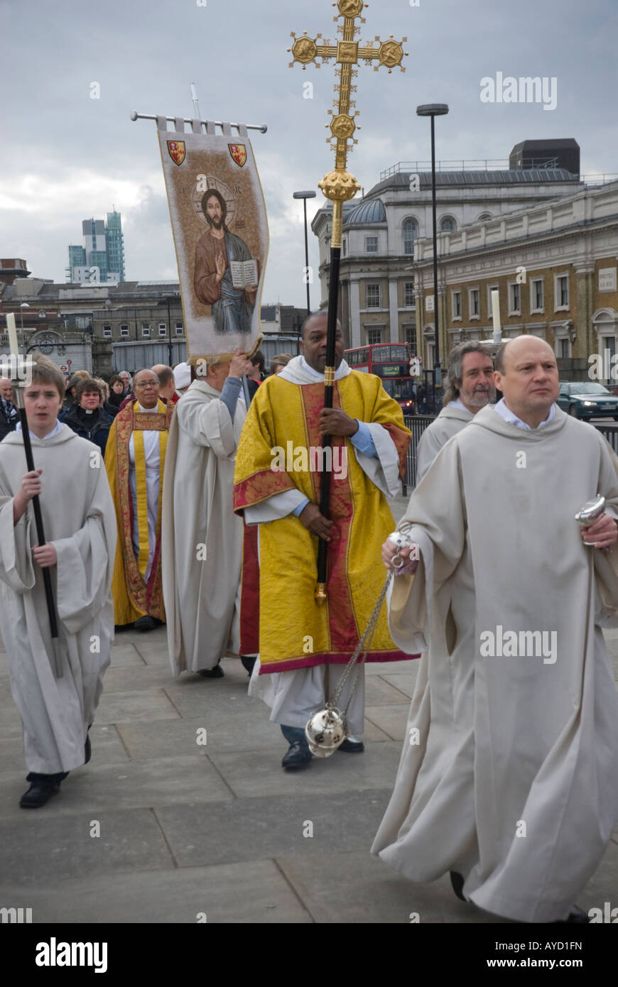 The procession from Southwark Cathedral comes up the bridge for the ...