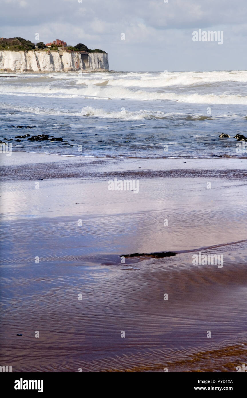Tide going out on Stone Bay Broadstairs Kent with white chalk cliffs in ...