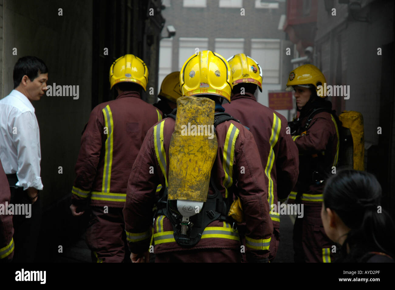 Five fire officers about to enter a burning restaurant in London's ...