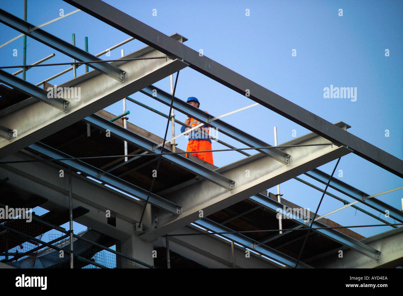 Builder on a construction site Stock Photo - Alamy