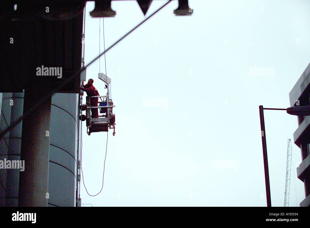 Skyscraper male window cleaner hi-res stock photography and images - Alamy