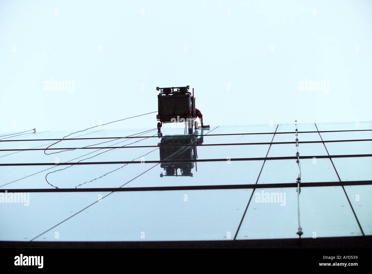 Window cleaning on skyscraper Stock Photo - Alamy