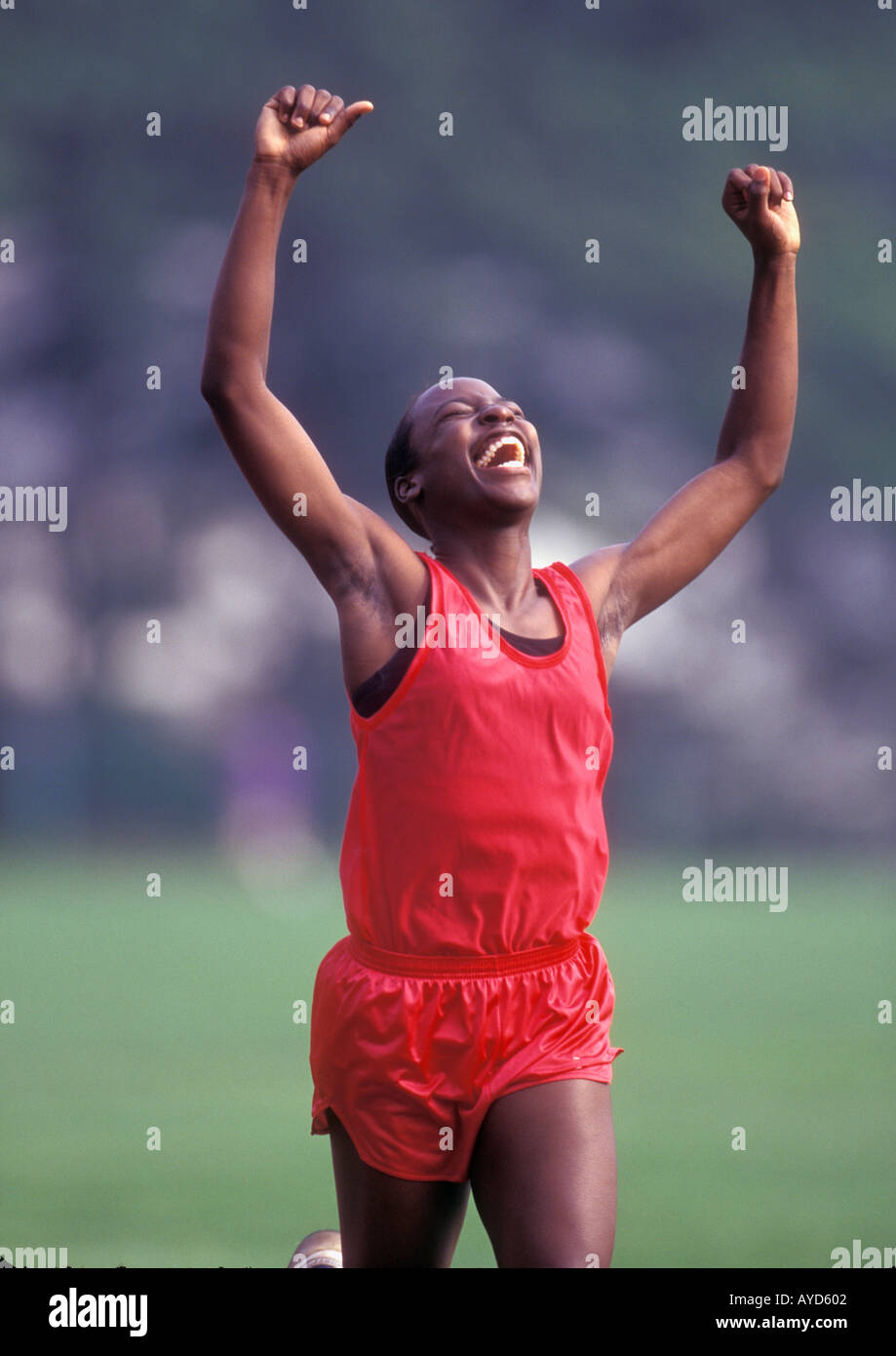 Runner celebrating a victory Stock Photo - Alamy