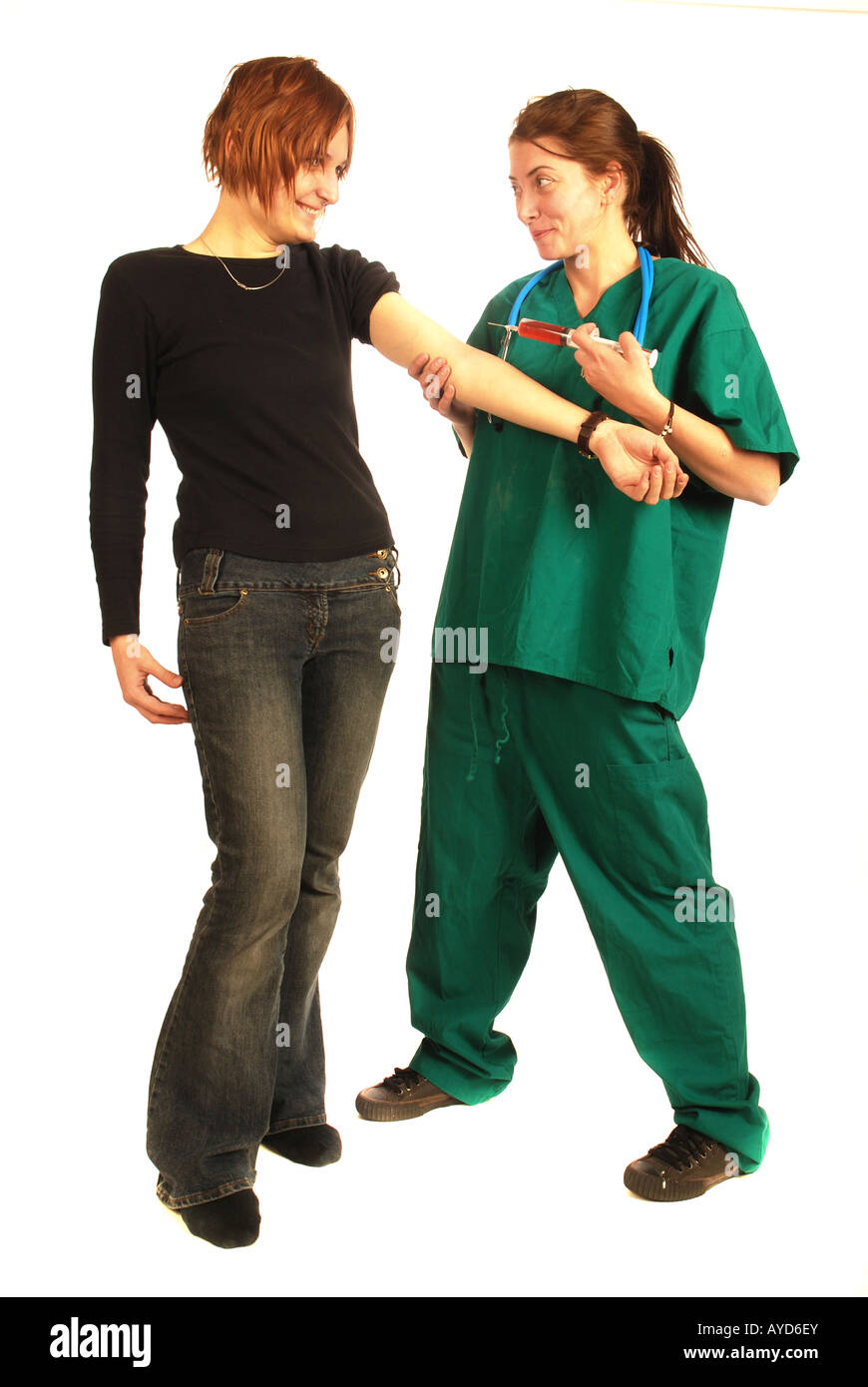Nurse preparing to give a patient a shot Stock Photo - Alamy