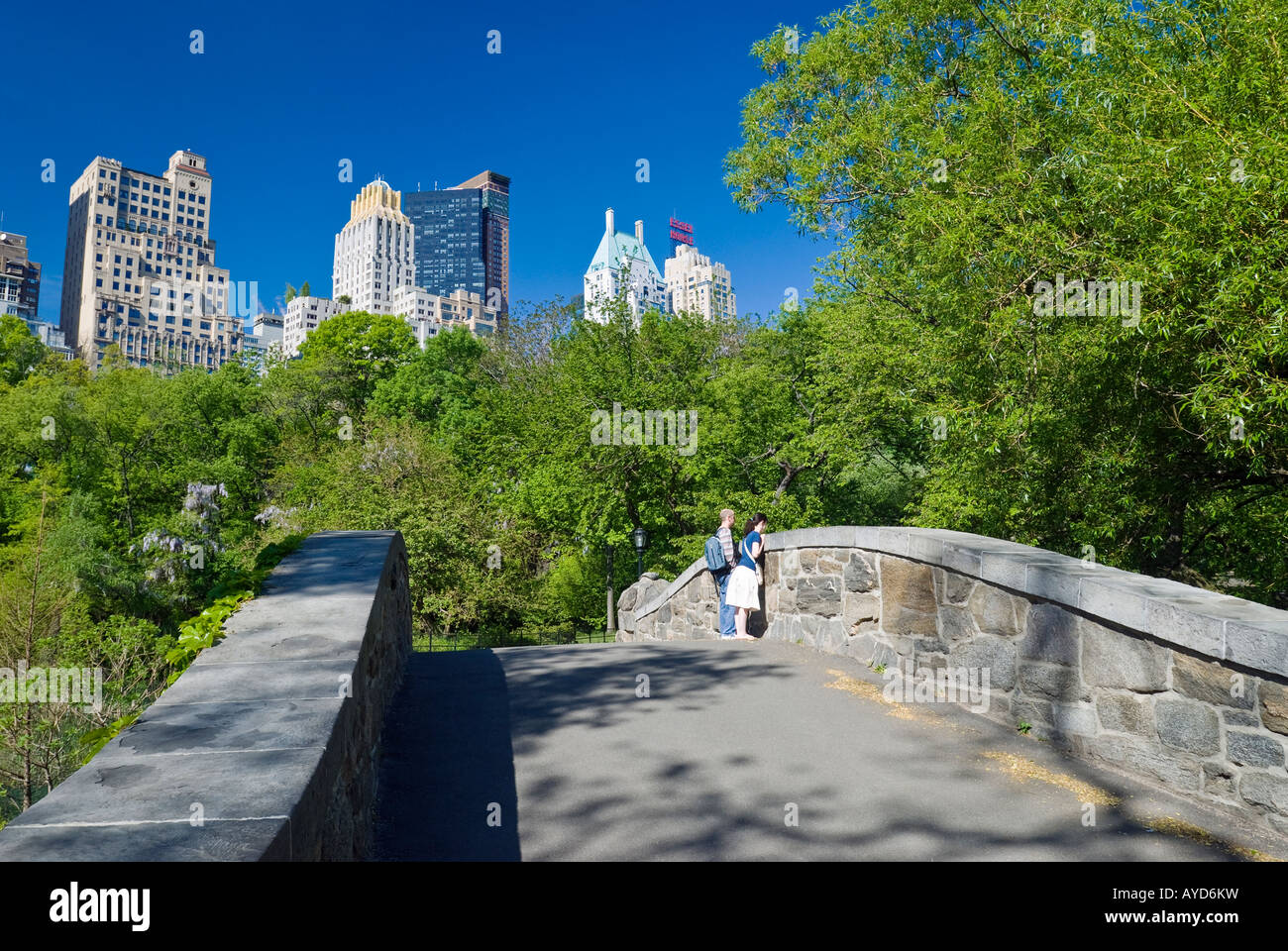 New York City, Central Park in springtime on Gapstow Bridge with view ...