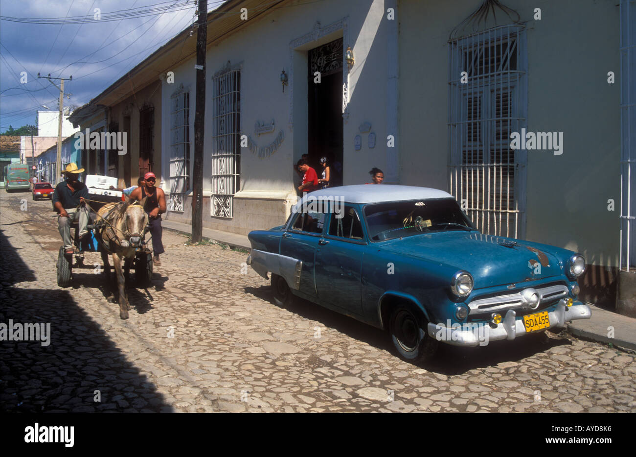 Street scene with oldtimer car and mule cart Trinidad UNESCO World ...