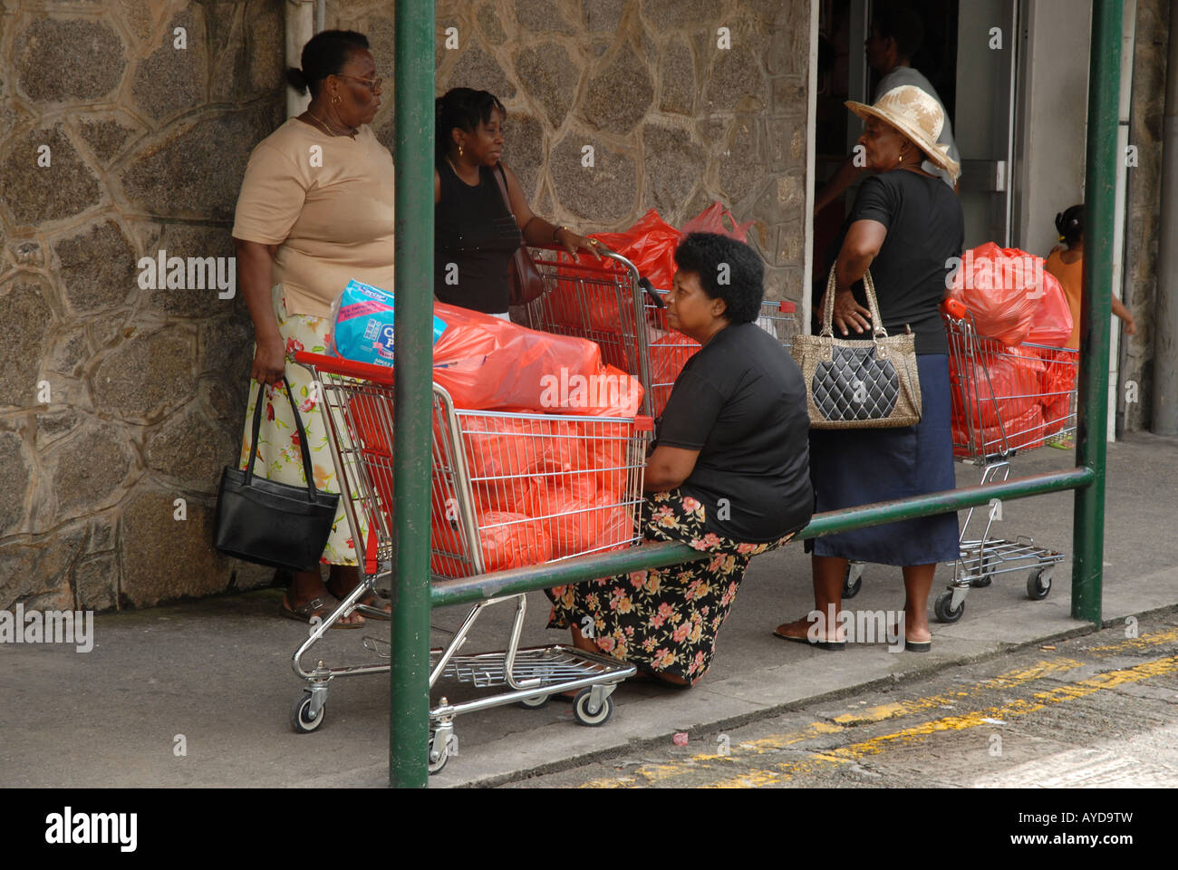 Local Seychellois ladies out shopping in Victoria the capitol of Mahe ...