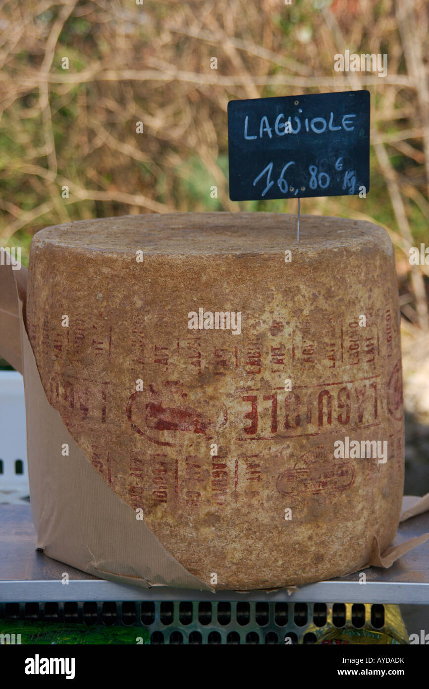 Laguiole cheese for sale on a French Market, Languedoc Roussillon ...
