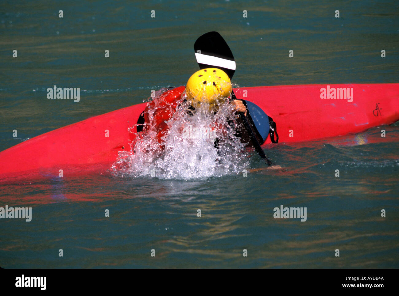 Kayaker rollover action adventure challenge Stock Photo - Alamy