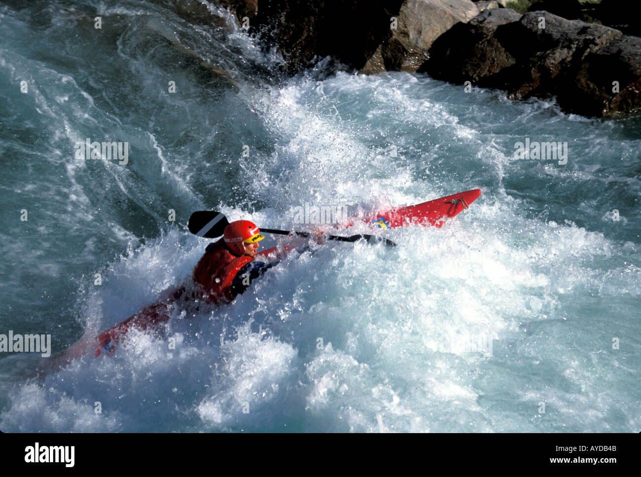 Whitewater Kayaking action adventure challenge Stock Photo - Alamy
