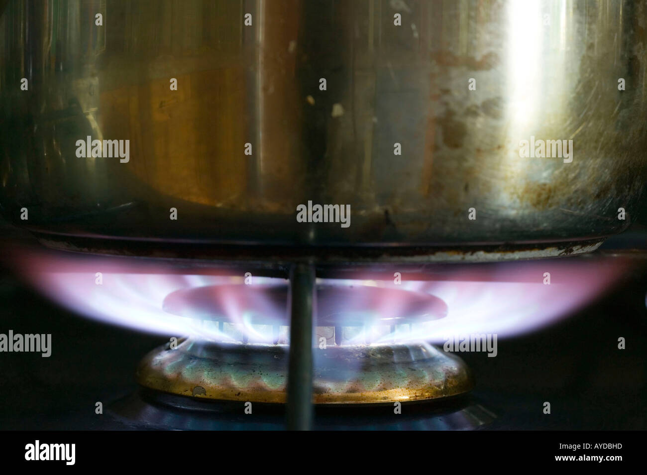 a pan on a gas stove Stock Photo - Alamy