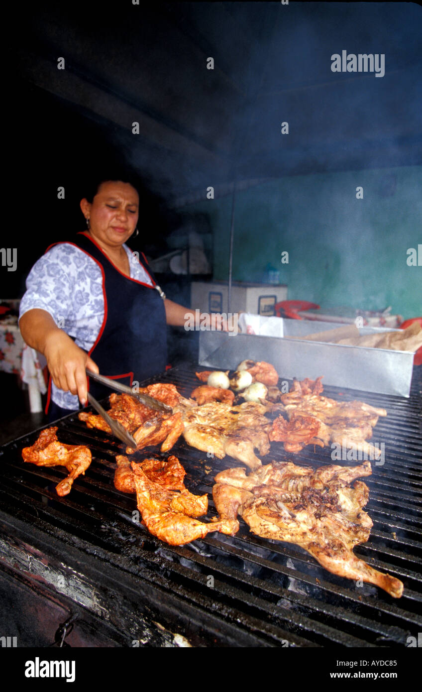 Woman cooking over fire hi-res stock photography and images - Alamy