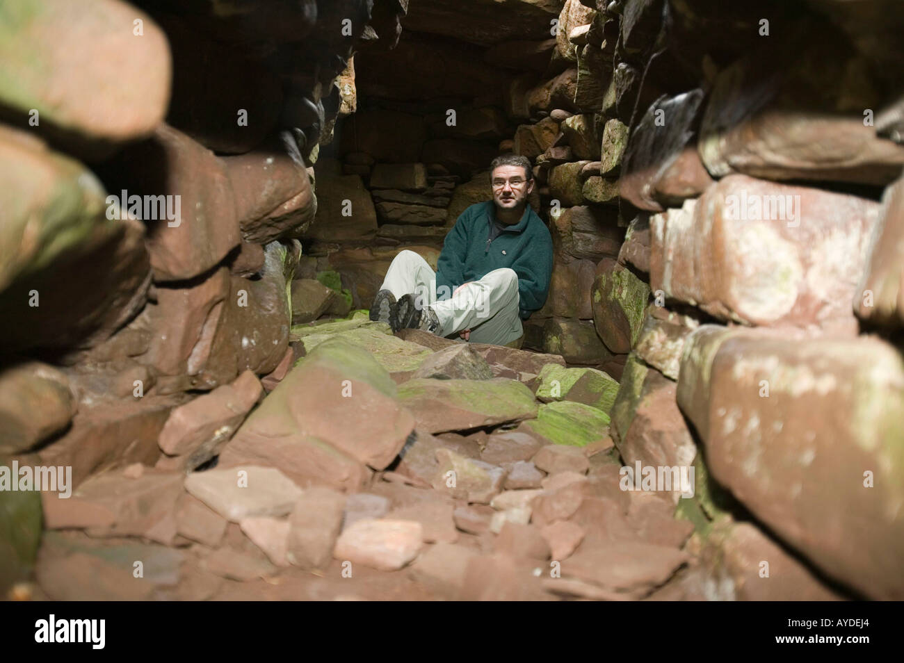 Man inside an ancient broch at Stoer, assynt, Scotland, UK Stock Photo ...