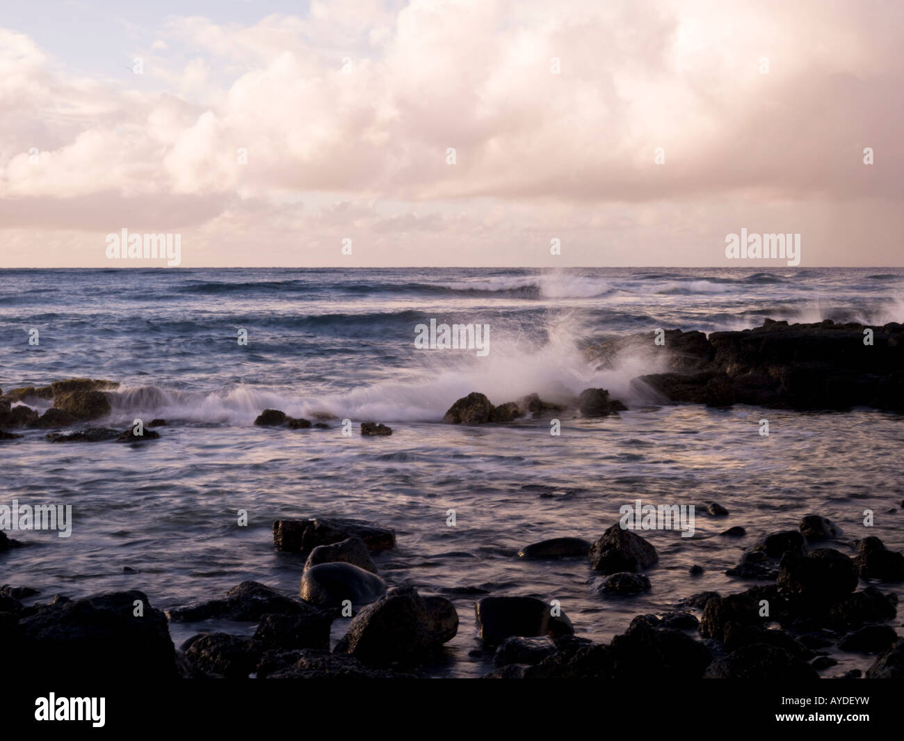 Waves and rocks, Poipu, Kauai, Hawaii Stock Photo - Alamy