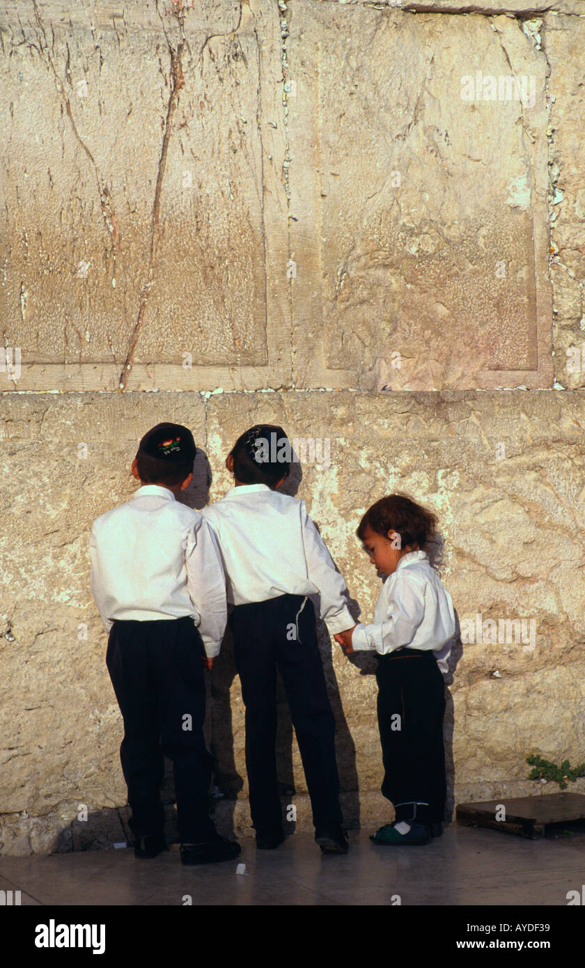 Isarel Jerusalem Old City Western Wall 3 young Jewish children praying ...