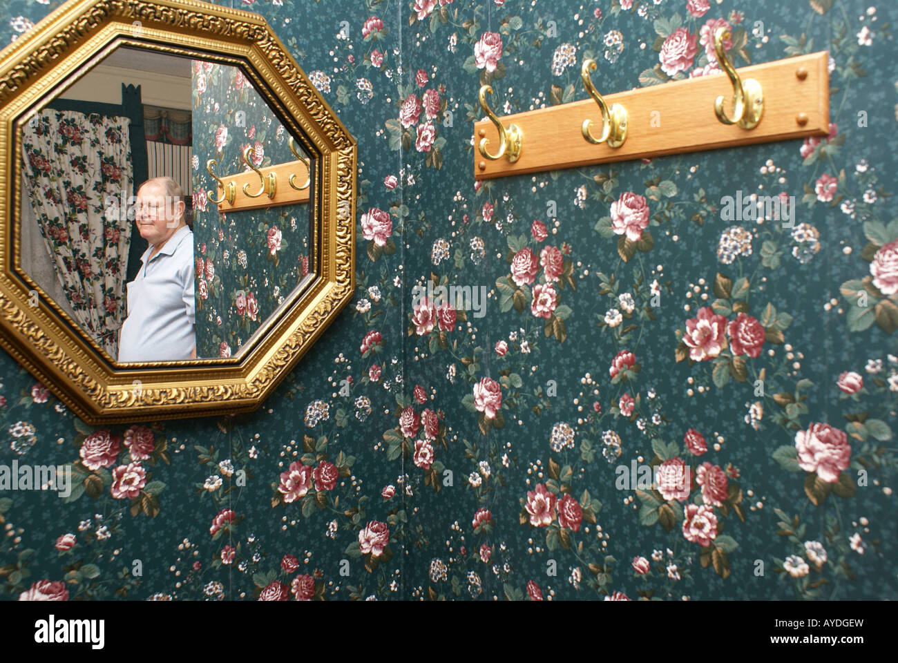 Reflection of man in mirror Stock Photo - Alamy