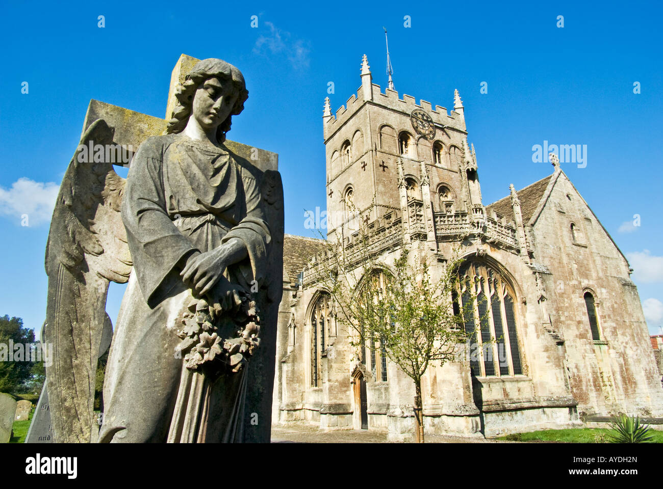 Winged angel in the churchyard of St Johns Norman church in Devizes ...