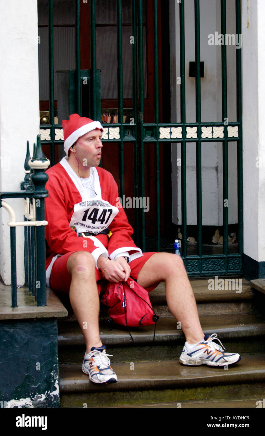 Man dressed as Santa Claus competing in the annual charity Santa Fun ...