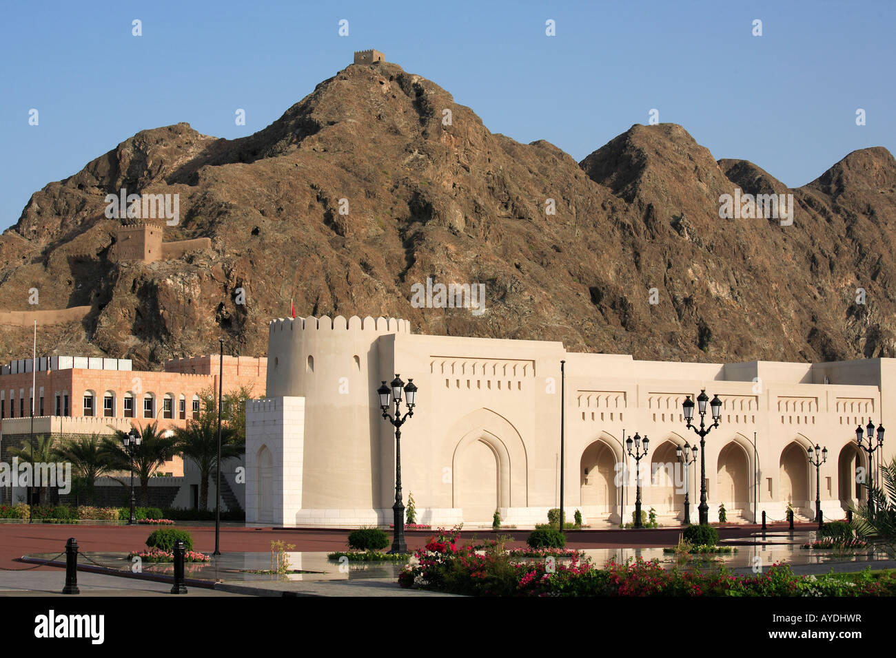 Oman Muscat government buildings colonnade mountain scenery Stock Photo ...