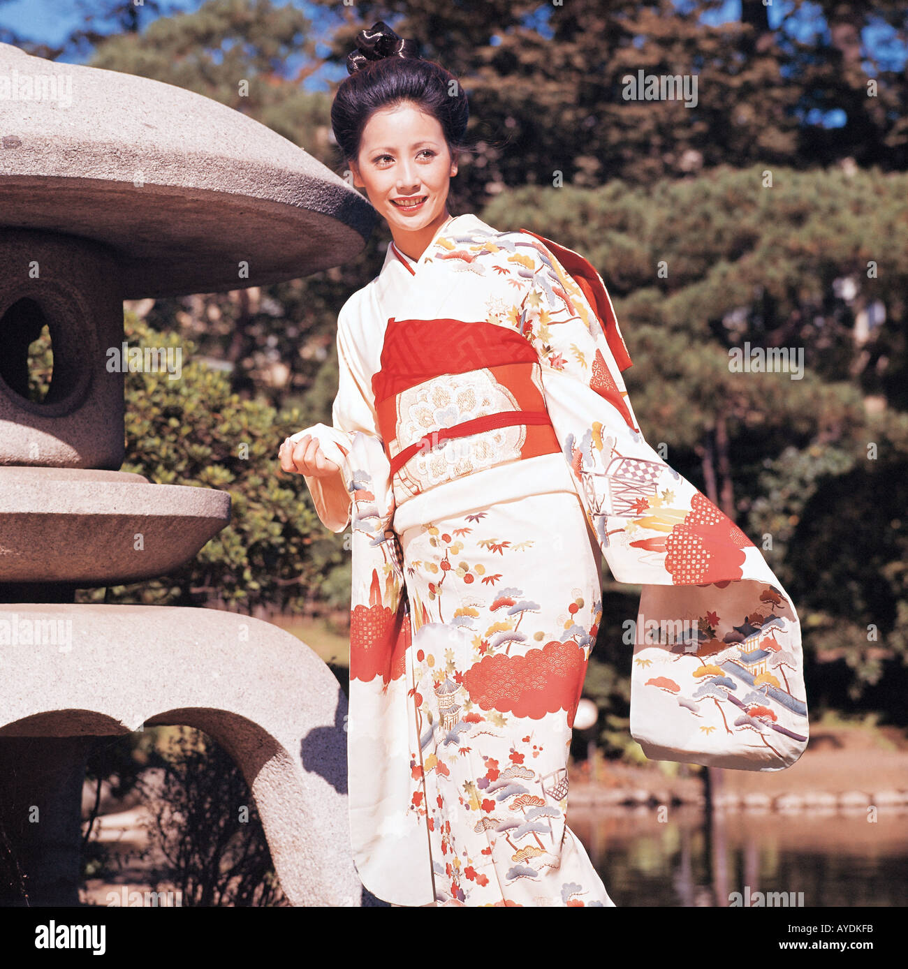 Japanese Woman with Tree Stock Photo - Alamy