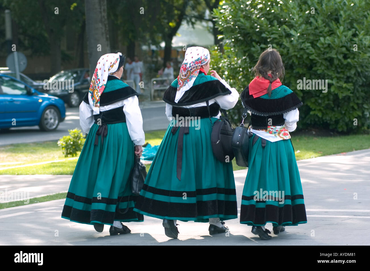 Three Basque women arrive wearing national costume for the festival of ...