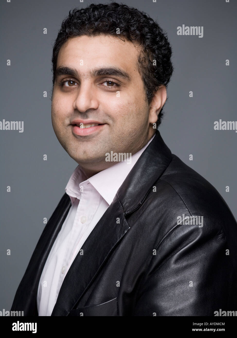 Studio portrait of young Asian man Stock Photo - Alamy