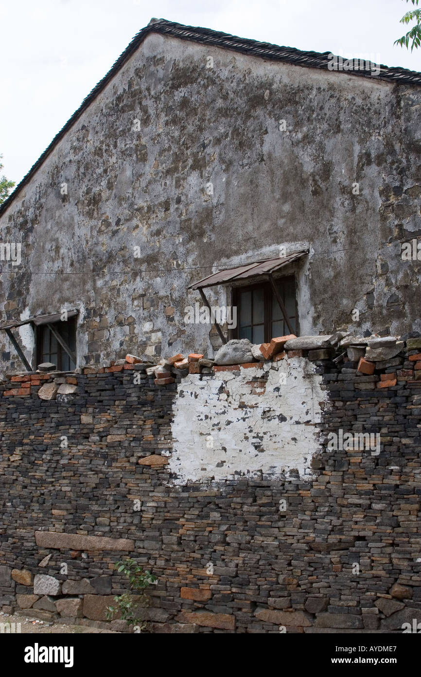 Wall of stone patched with brick hi-res stock photography and images ...
