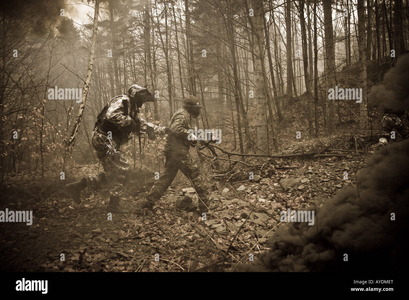 Two anti-terrorist soldiers during a training with paintball guns. They ...