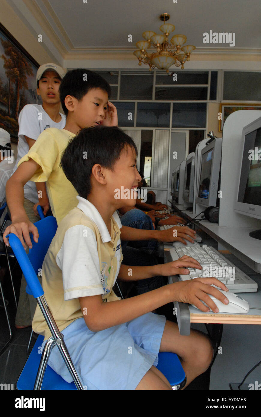 Children with computers in a Internet café city of Hue Vietnam Stock ...