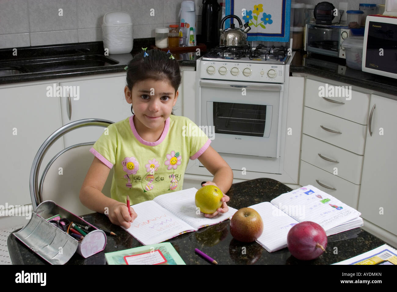 kid doing homework Stock Photo - Alamy