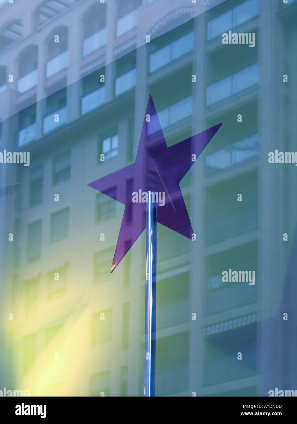 colourful star in shop window display Stock Photo - Alamy