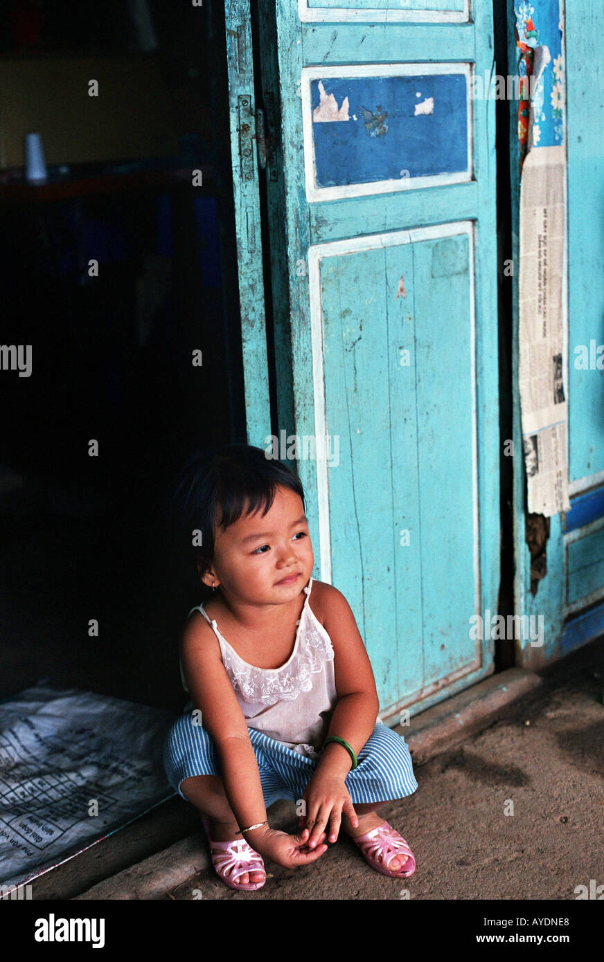 Child outside house vietnam hi-res stock photography and images - Alamy