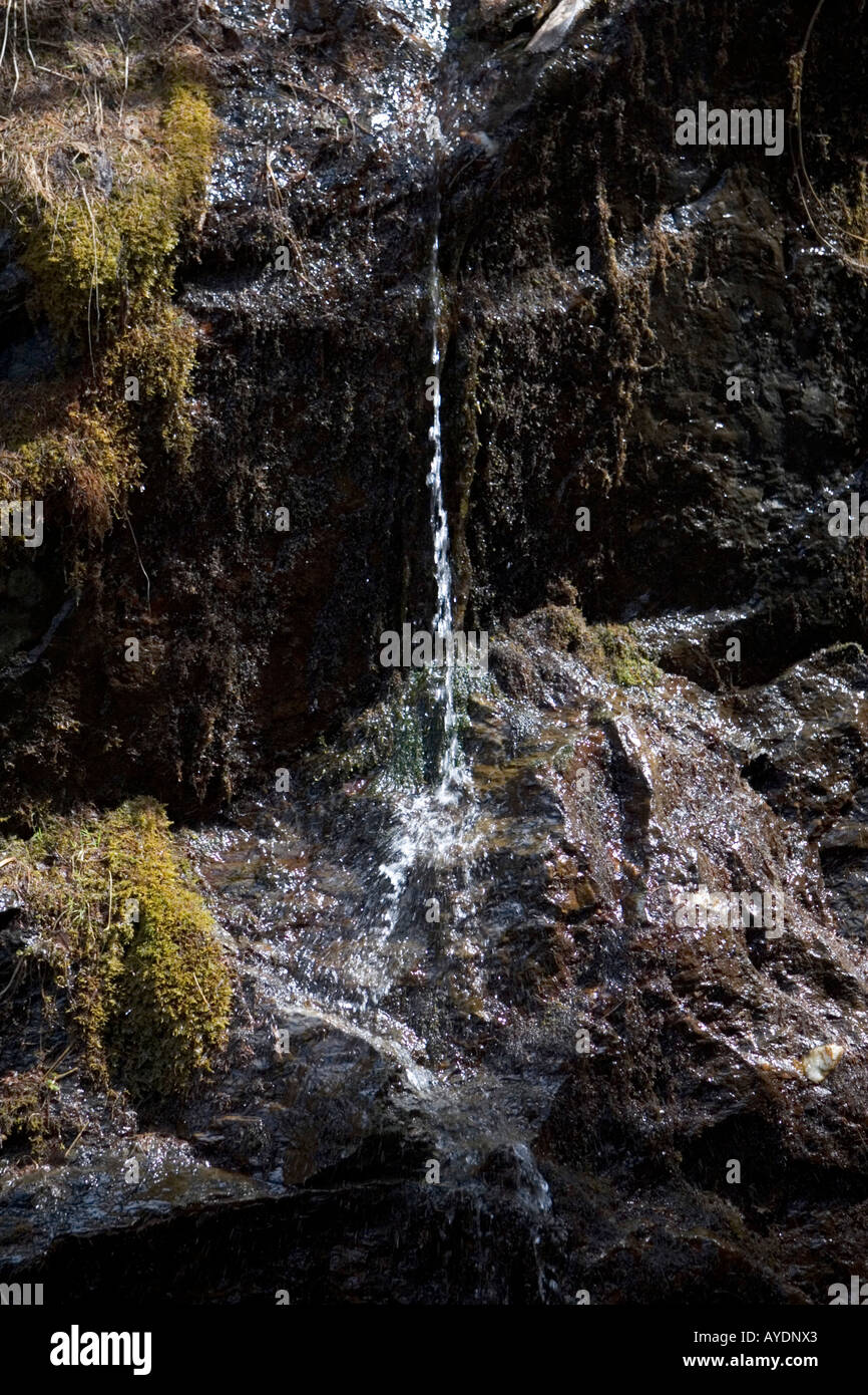 Melted ice water dripping down rocks Stock Photo - Alamy