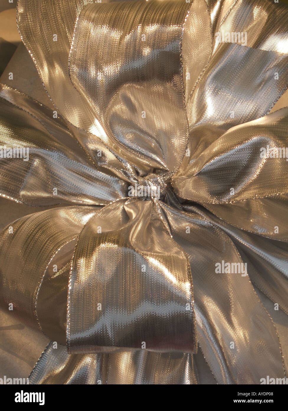 gifts wrapped in gold Stock Photo - Alamy