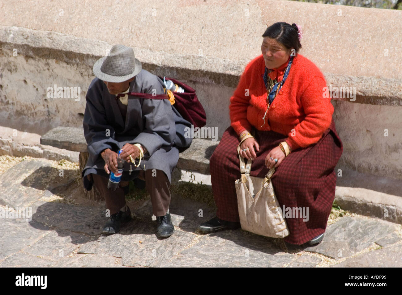 Weary Tibetan pilgrims at the Potala Palace in Lhasa, Tibet Stock Photo ...