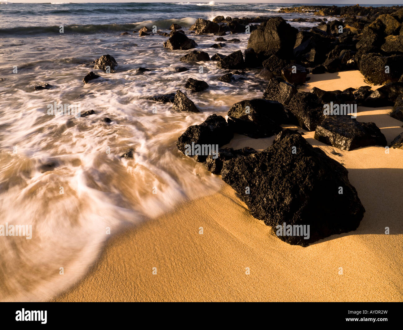 Rocks on the beach, Poipu, Kauai, Hawaii Stock Photo - Alamy