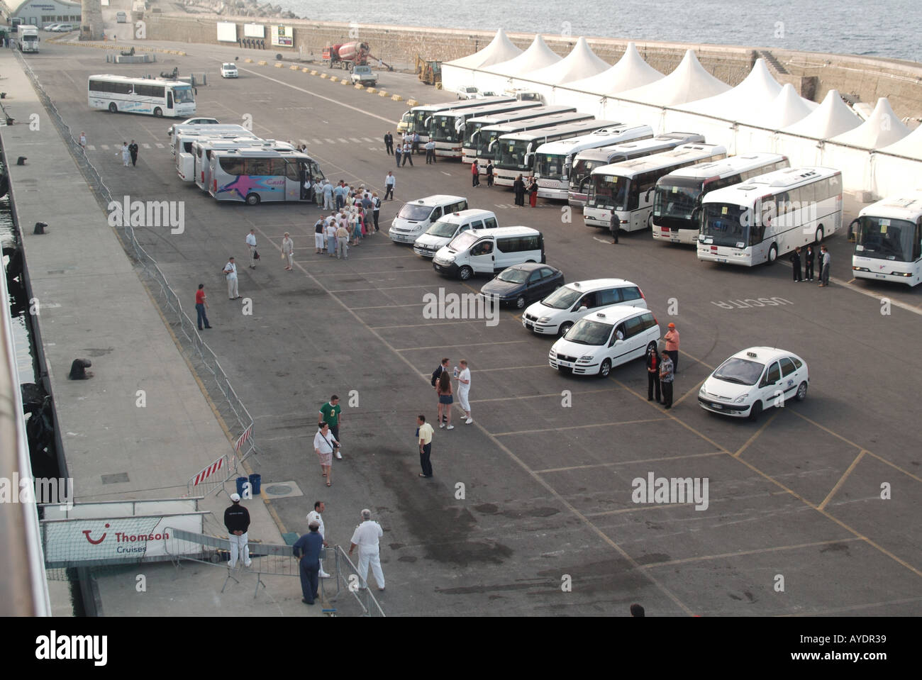 Civitavecchia Thomson cruise ship at dockside with coaches mini buses ...